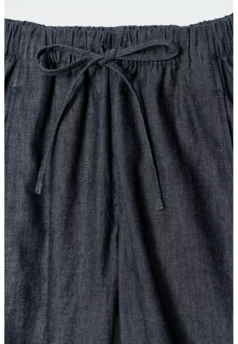 Buy COS BARREL-LEG DENIM DRAWSTRING TROUSERS 2025 Online | ZALORA ...