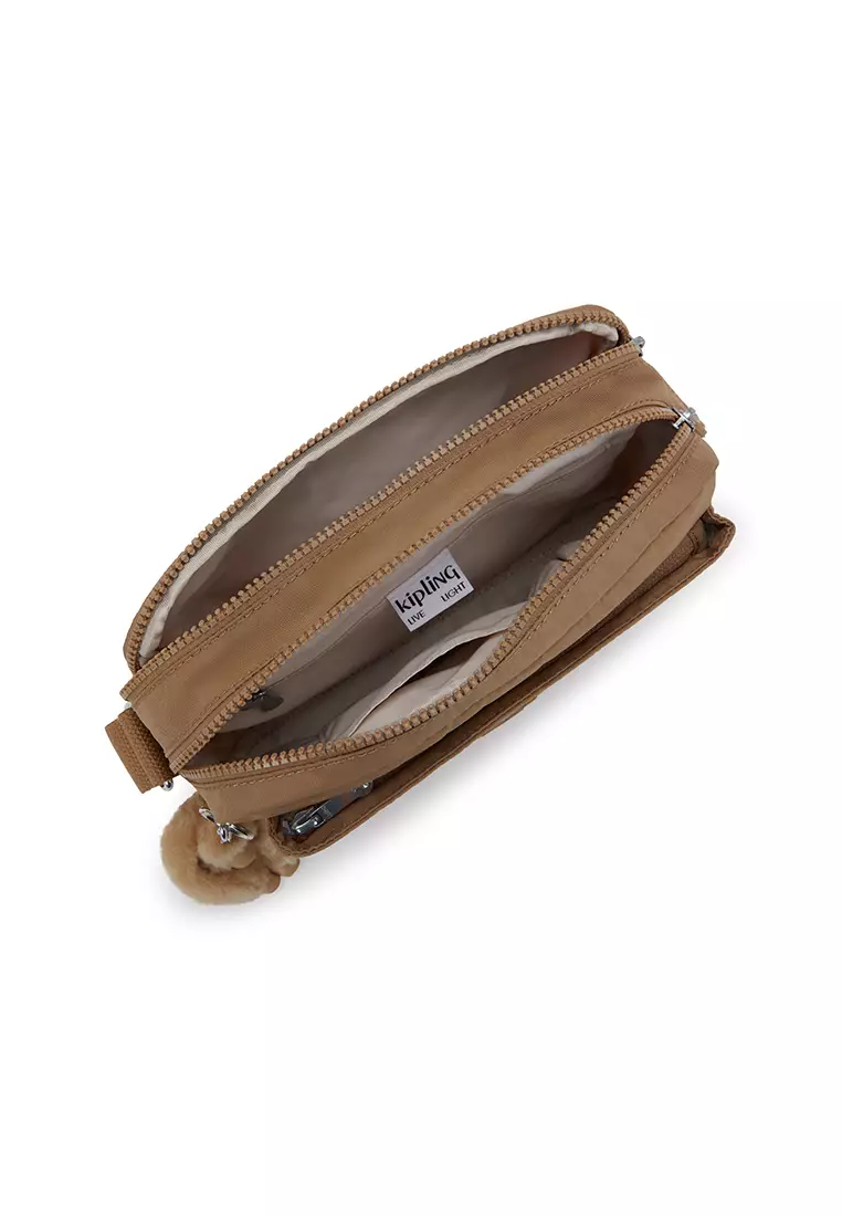 Buy Kipling ABANU M Early Tan Crossbody Bag 2025 Online | ZALORA