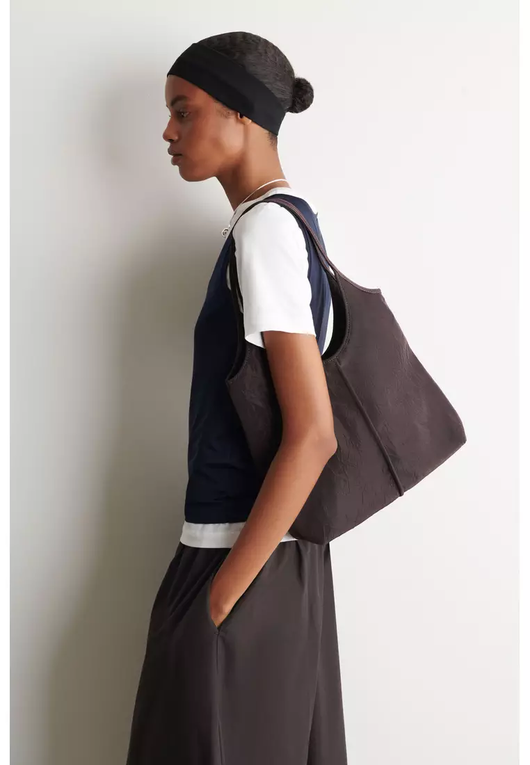 Buy COS SCULPTED TOTE BAG - CRINKLED SHELL 2026 Online | ZALORA