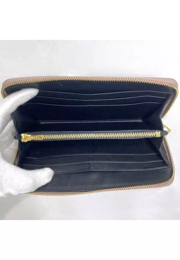 Buy Loewe Pre-Loved Loewe Pink Leather Zip Around Wallet Online ...