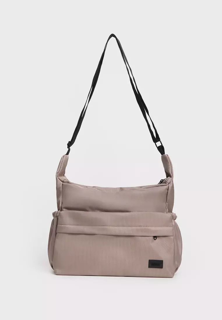 Buy Penshoppe Regular Sling Bag with Frontal Pocket and Rubber Patch 2025 Online | ZALORA ...