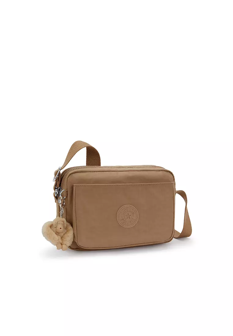 Buy Kipling ABANU M Early Tan Crossbody Bag 2025 Online | ZALORA