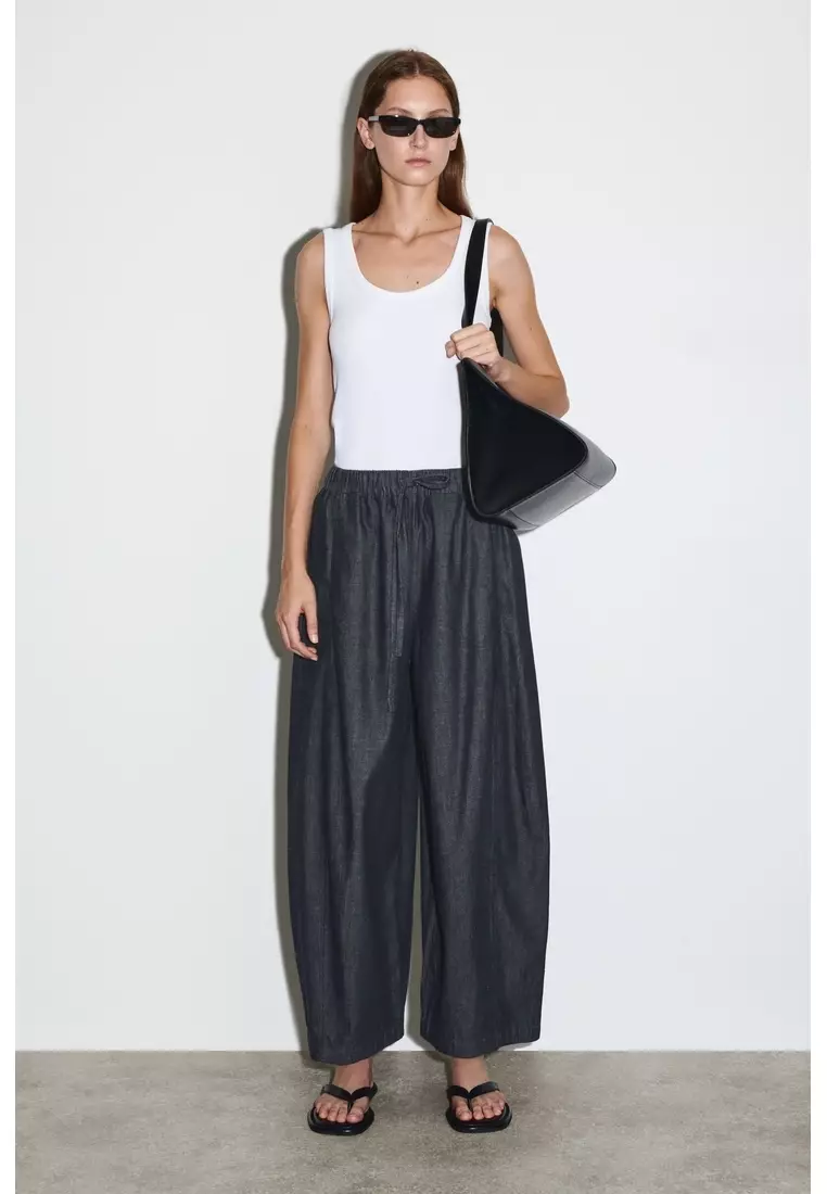 Buy COS BARREL-LEG DENIM DRAWSTRING TROUSERS 2026 Online | ZALORA ...