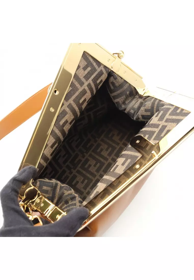 Buy Fendi Pre-Loved Fendi First Medium Clutch bag leather light brown ...