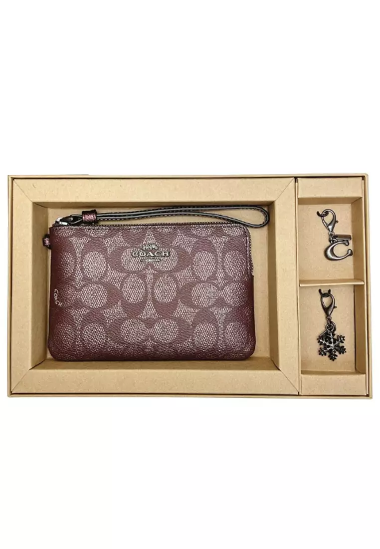 Buy Coach Boxed Corner Zip Wristlet In Signature Canvas With Charms ...
