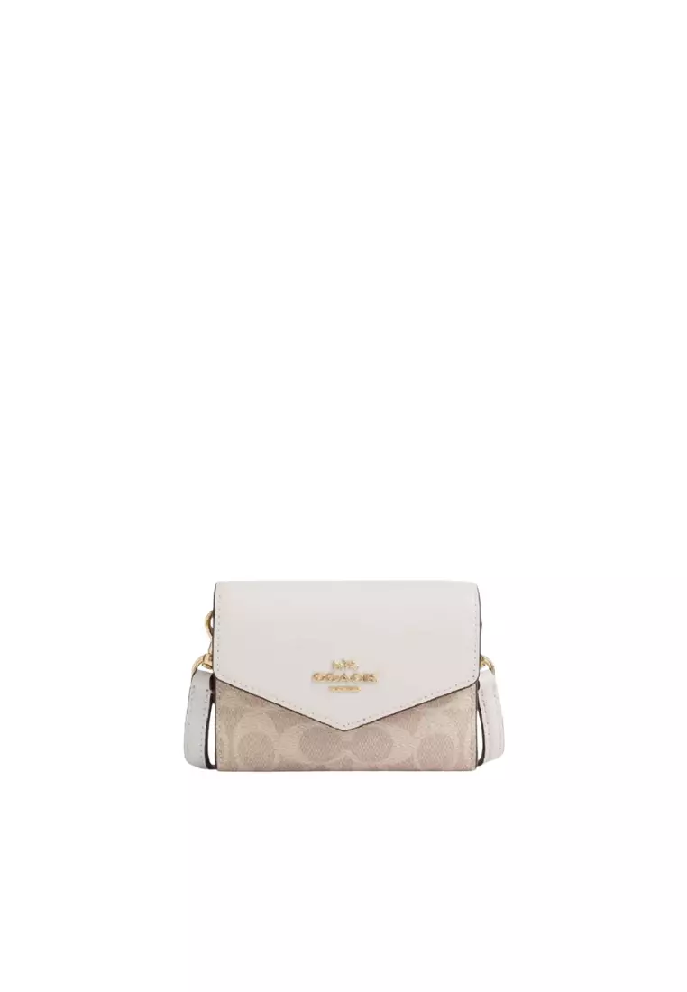 Buy Coach Coach Mini Envelope Wallet With Strap Signature Canvas In ...