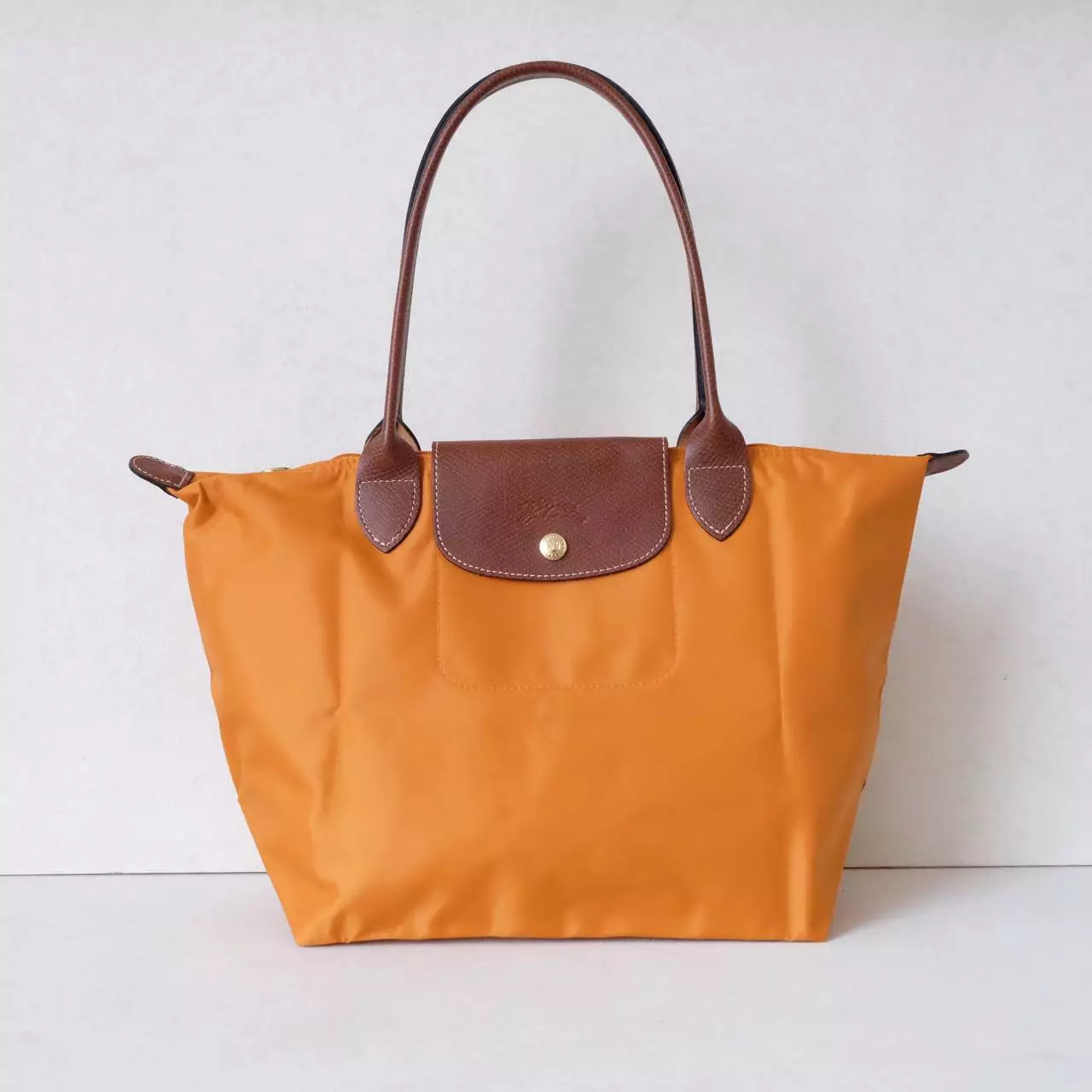 Jual LONGCHAMP Le Pliage Original Small Long Handle Orange Original ...