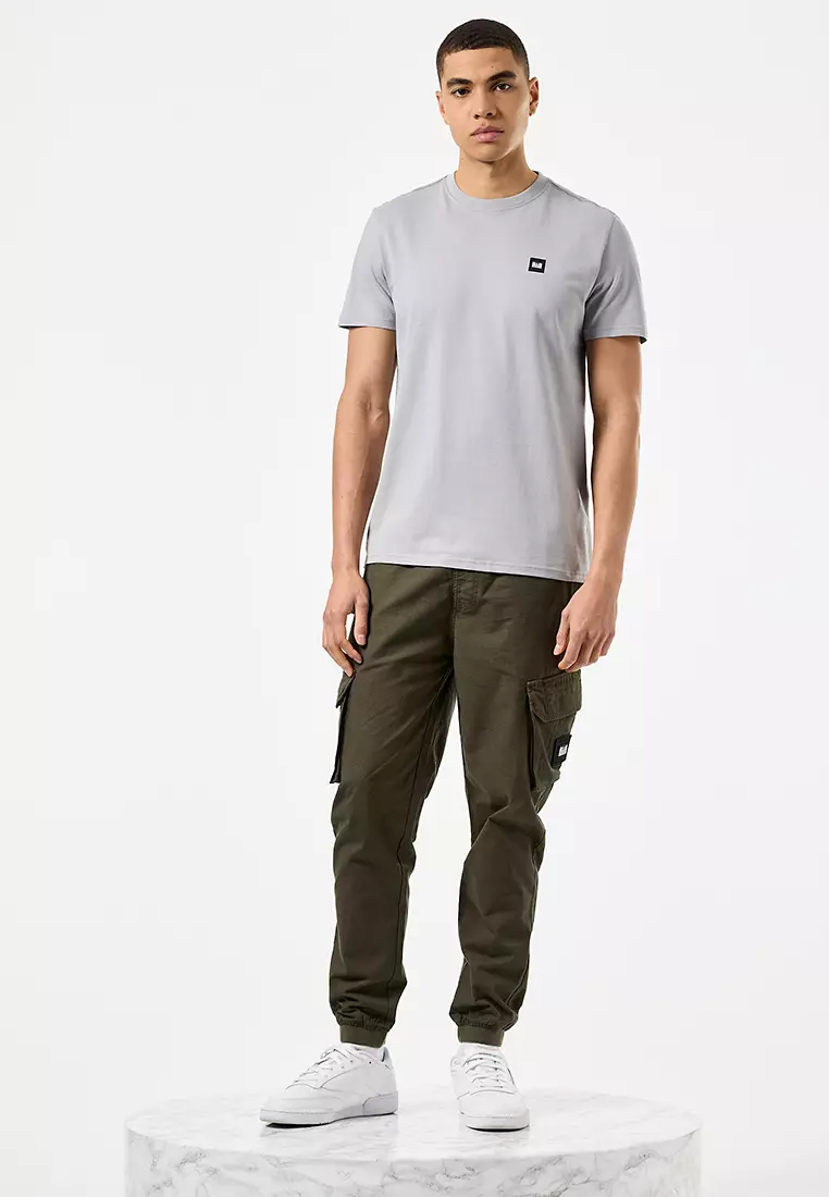 Jual Weekend Offender MENS SMOKEY CANNON BEACH BADGE TEE Original 2025 ...