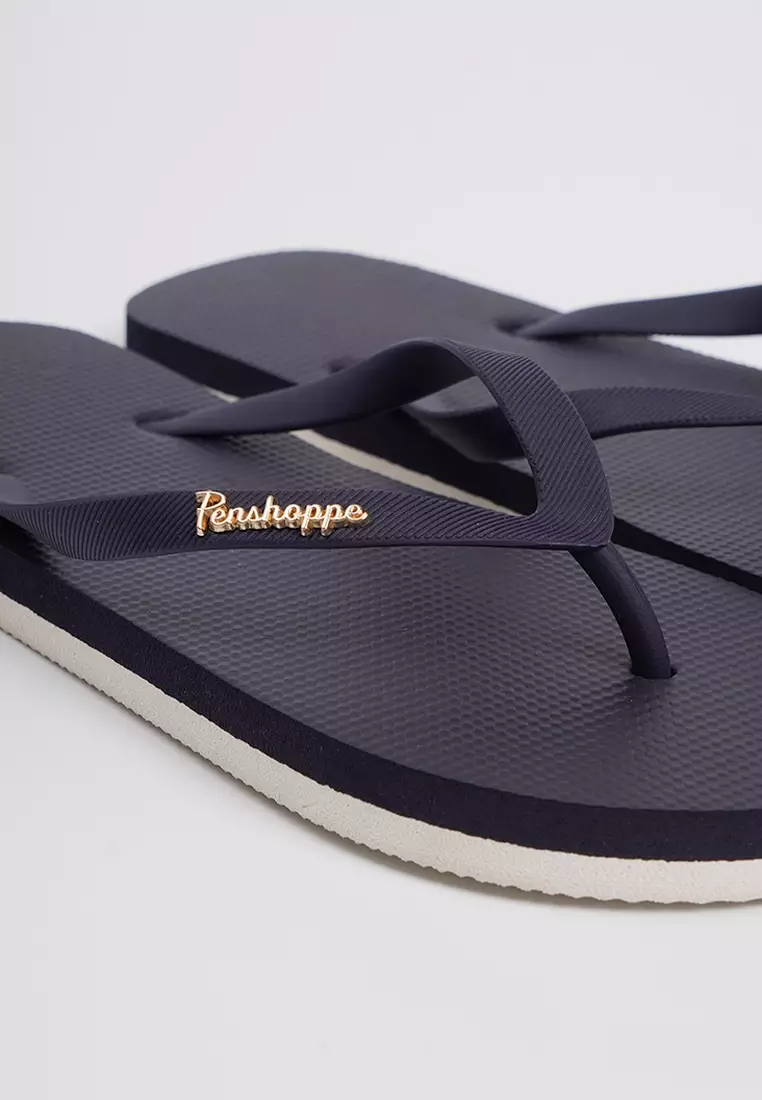 Buy Penshoppe Women's Flip Flops with Metal Branding and Contrast ...
